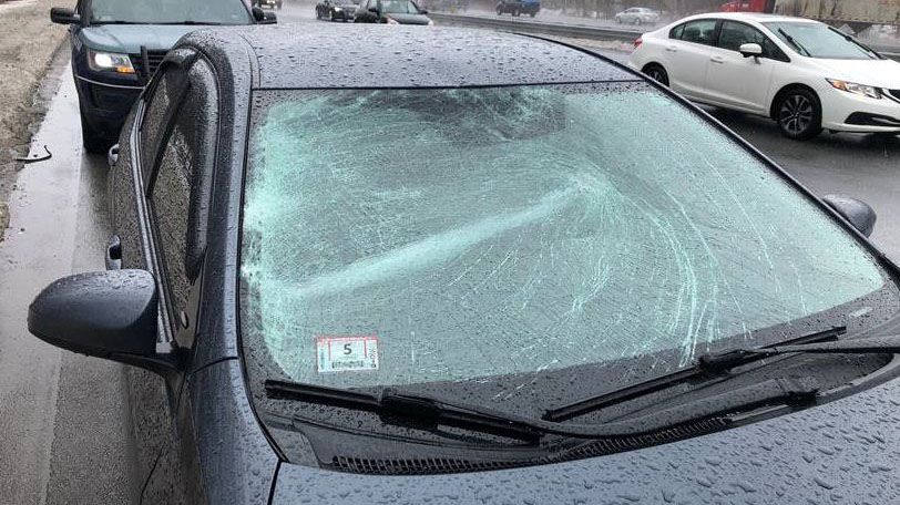 19-year-old driver narrowly avoids injury when ice crashes through ...