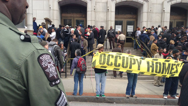 Occupy leader knocked down during courthouse protest