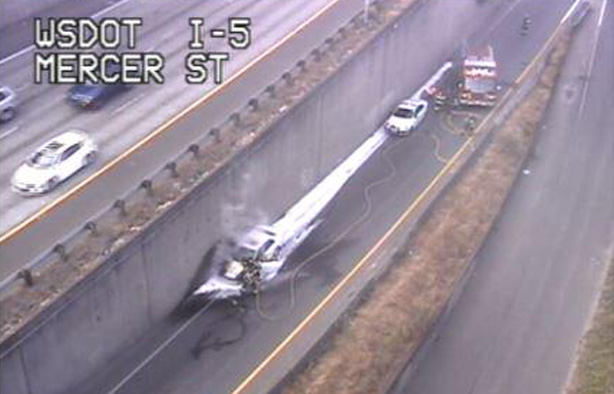 Car fire on I-5 onramp from Mercer in Seattle causing backups