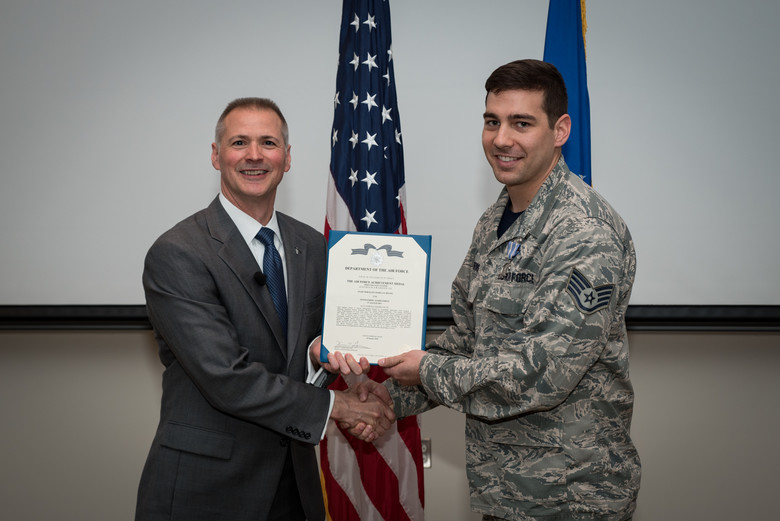 WPAFB Airmen awarded the Air Force Achievement Medal after saving a co ...