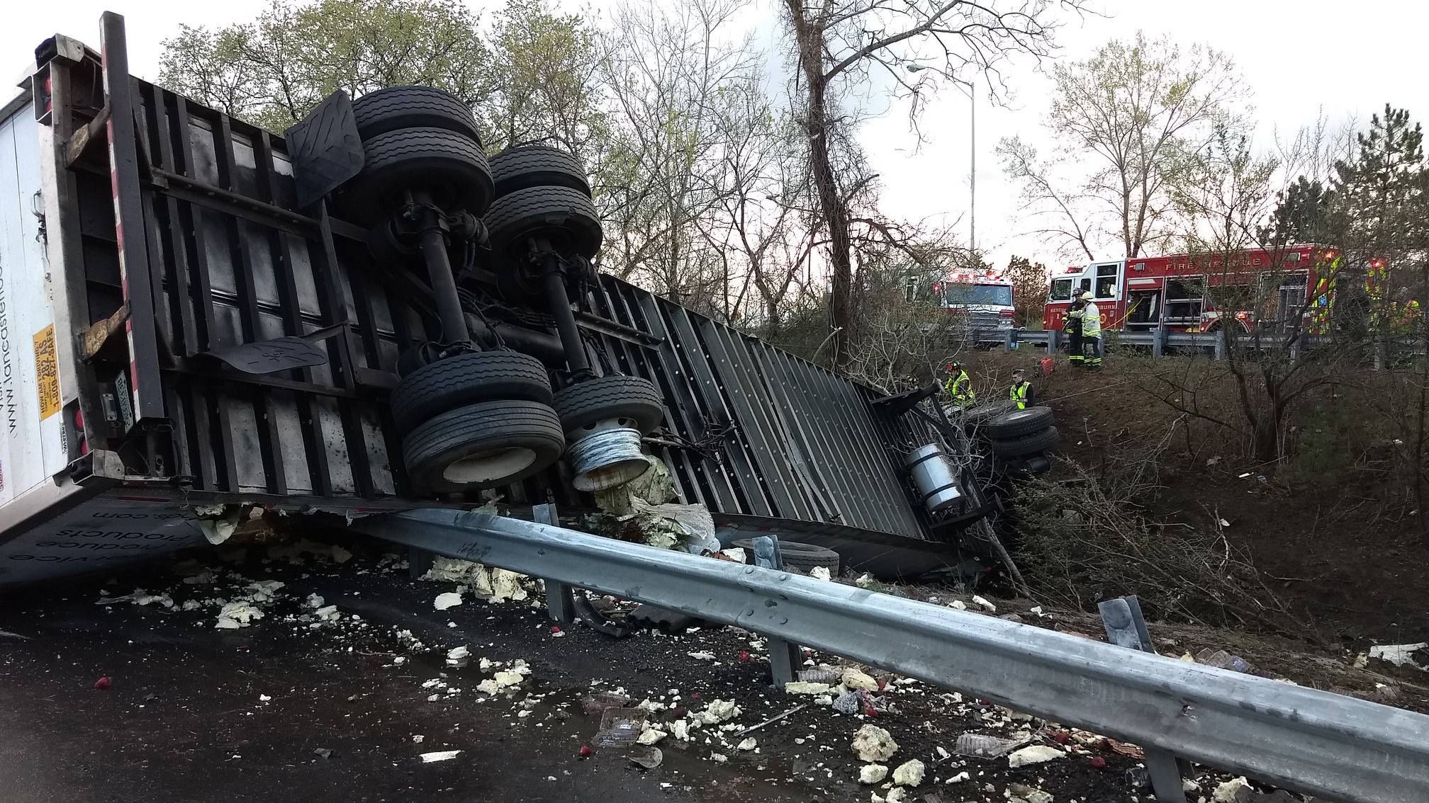 Driver freed from rolled over tractor-trailer after three hours on I-90 ...