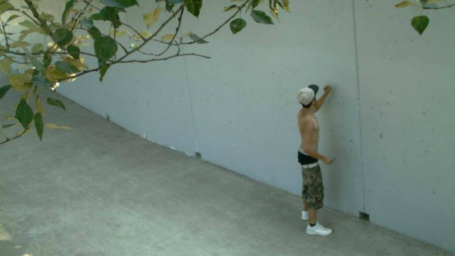 Graffiti artist caught on camera. Can you tell Puyallup police who he is?